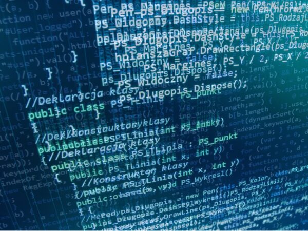 Software Developer Programming Code On Computer Todays General Counsel